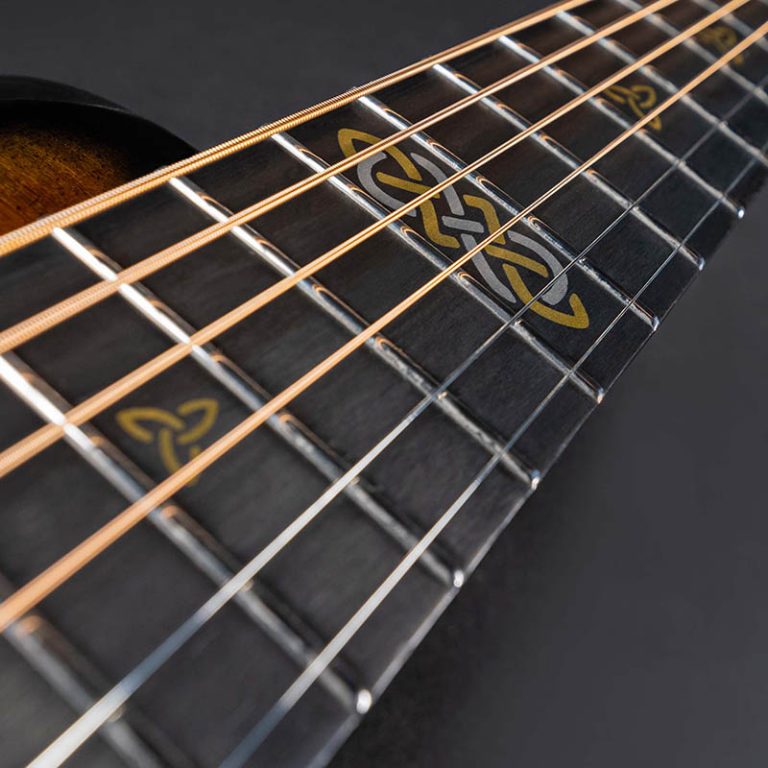 The Virtuo's Adjustable Bridge - Emerald Guitars